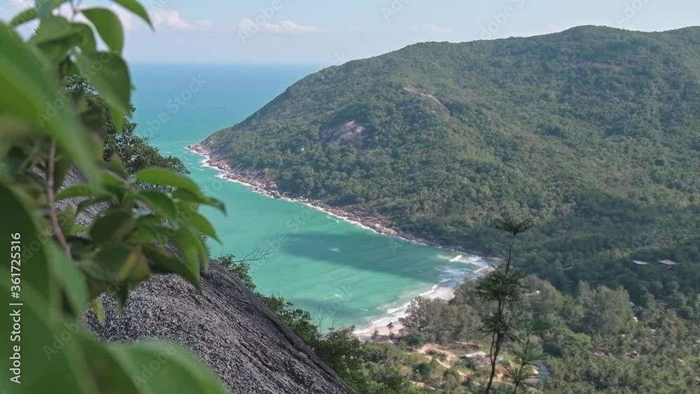 Stone top among the jungle. Blue sky with white clouds. At the top of ...