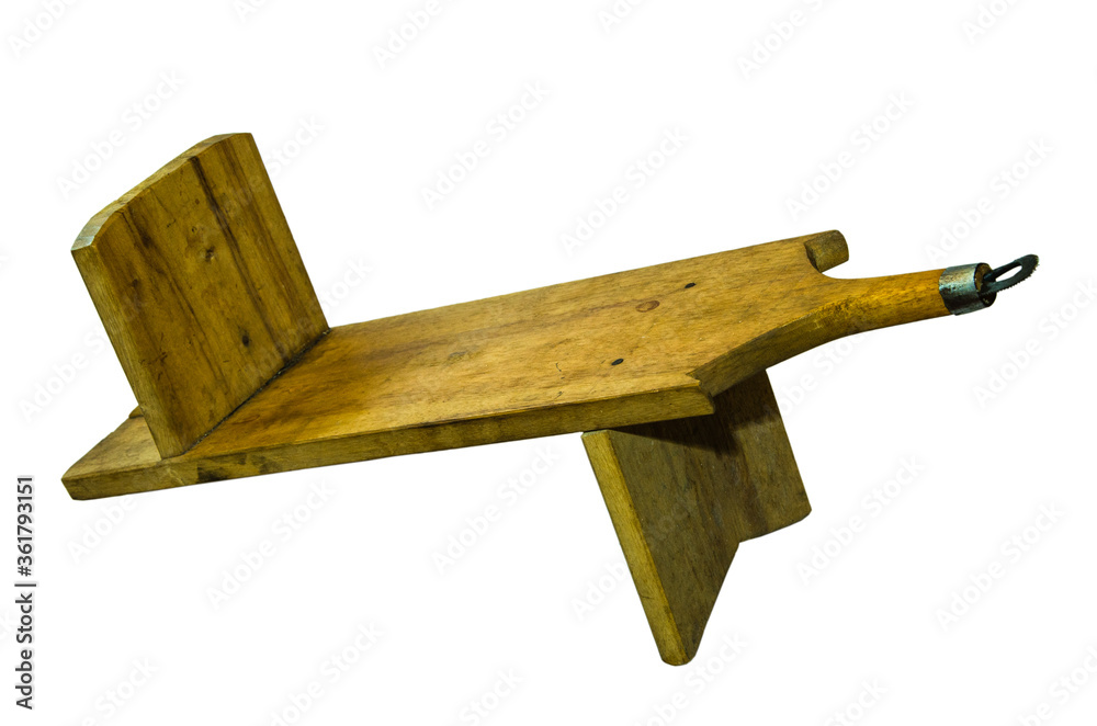 Râpe à coco traditionnelle malgache sur fond blanc Stock Photo | Adobe ...