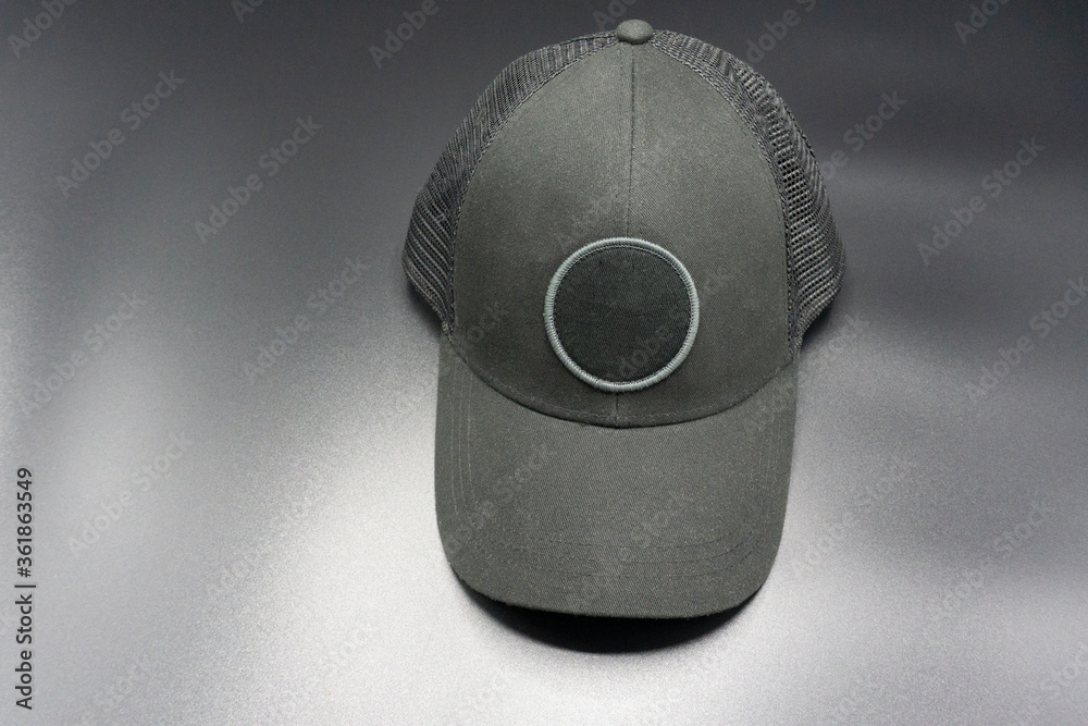 Black baseball cap with round space for logo. Top front view, isolated ...