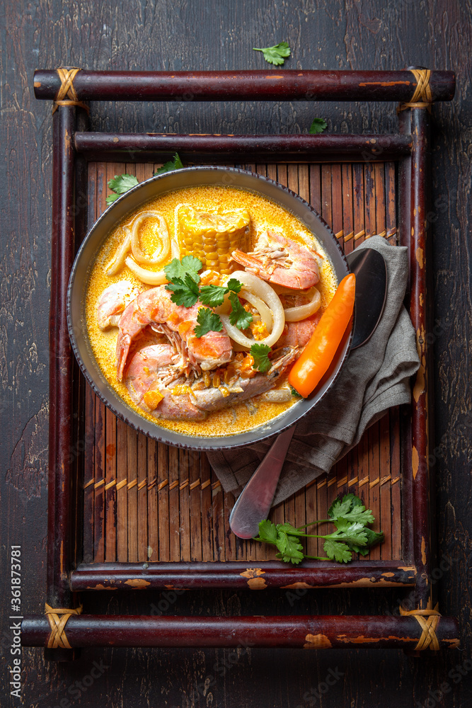 Peruvian seafood soup Chupe de Camarones in gray bowl, top view Stock ...