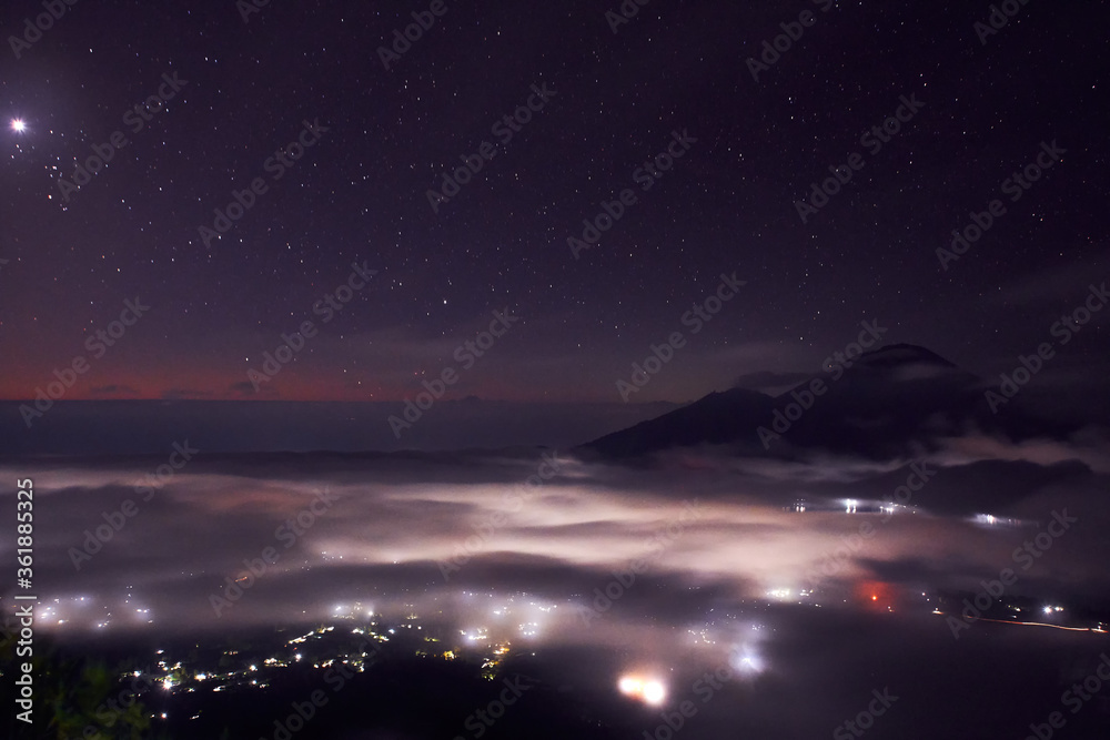 Bali indonesian island from the top of Batur mountain at the night time ...