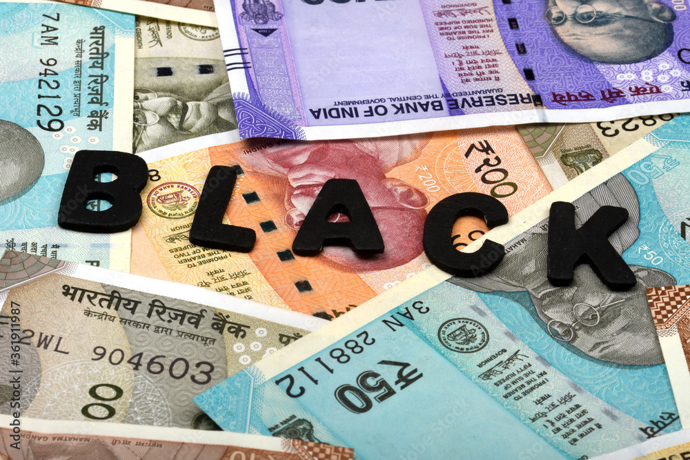Black money concept,black alphabet on money background,Indian Currency ...