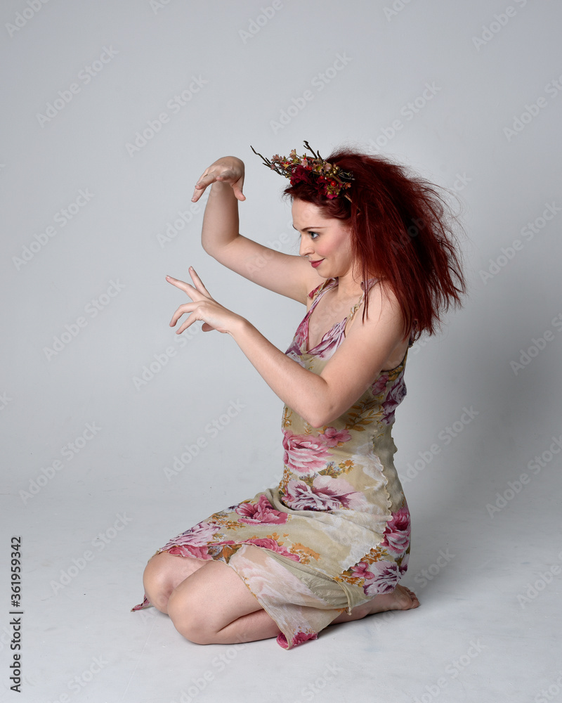 full length pose of red hair girl wearing floral fairy dress and ...