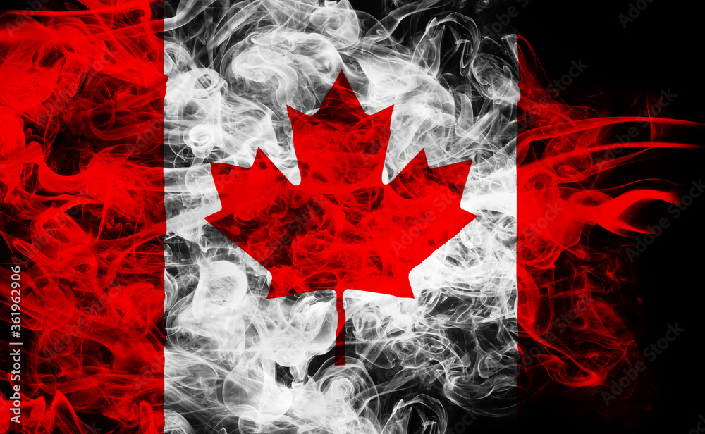 Smoke shape of national canadian flag of Canada isolated on black ...