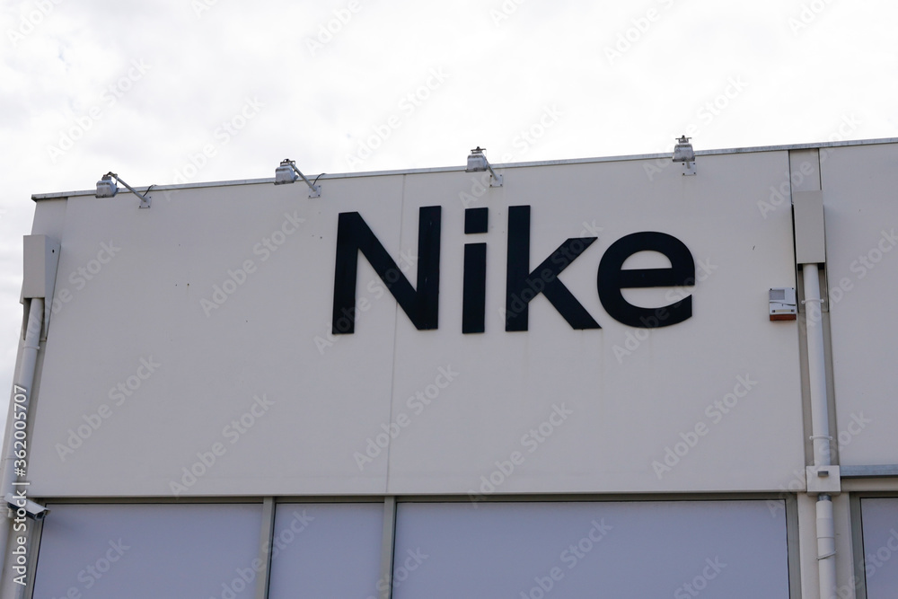 Nike logo sign on store American shop multinational corporation ...