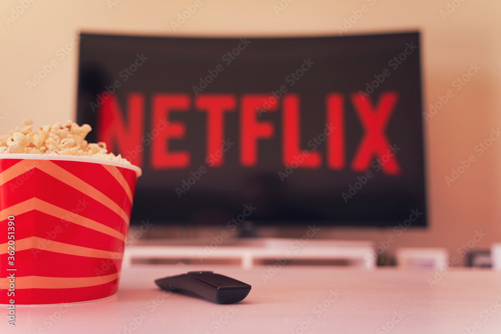 Istanbul, Turkey - July 03, 2020: Table with popcorn bottle and Netflix ...