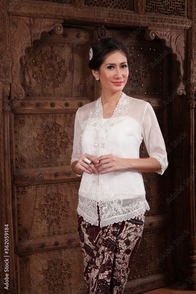 Beautiful woman wearing an elegant kebaya, kebaya is a traditional ...