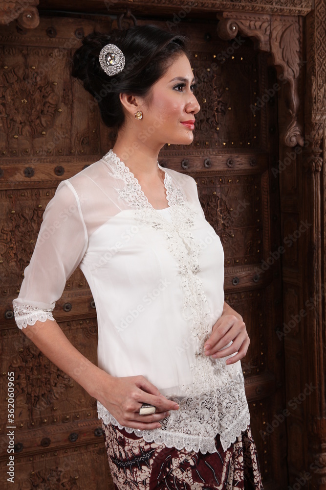 Beautiful woman wearing an elegant kebaya, kebaya is a traditional ...