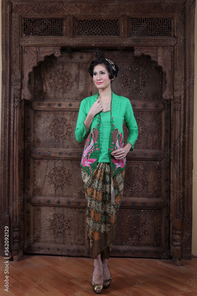 Beautiful woman wearing an elegant kebaya, kebaya is a traditional ...