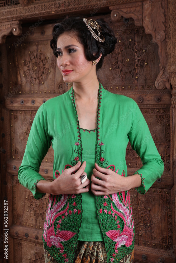 Beautiful woman wearing an elegant kebaya, kebaya is a traditional ...