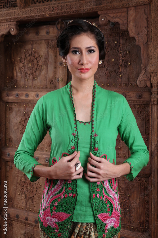 Beautiful woman wearing an elegant kebaya, kebaya is a traditional ...