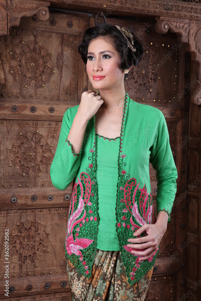 Beautiful woman wearing an elegant kebaya, kebaya is a traditional ...