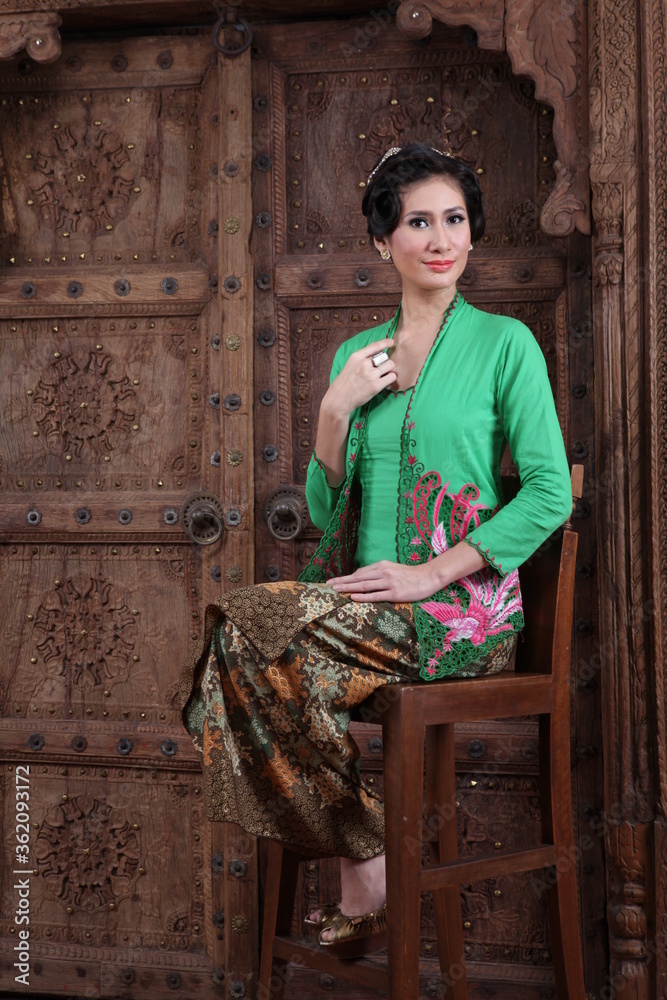 Beautiful woman wearing an elegant kebaya, kebaya is a traditional ...