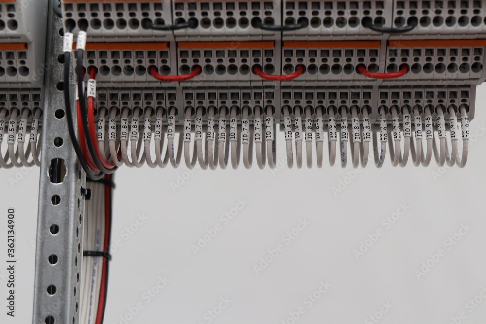 Pass-through electrical terminals for connecting wires in electrical ...
