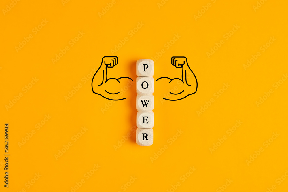 The word power on wooden cubes with hand drawn muscle arms. Concept of ...