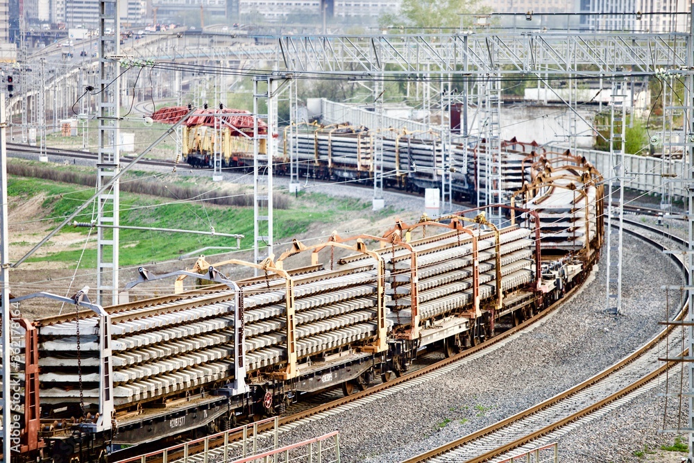 Freight train transports railway elements. Modern railways ...