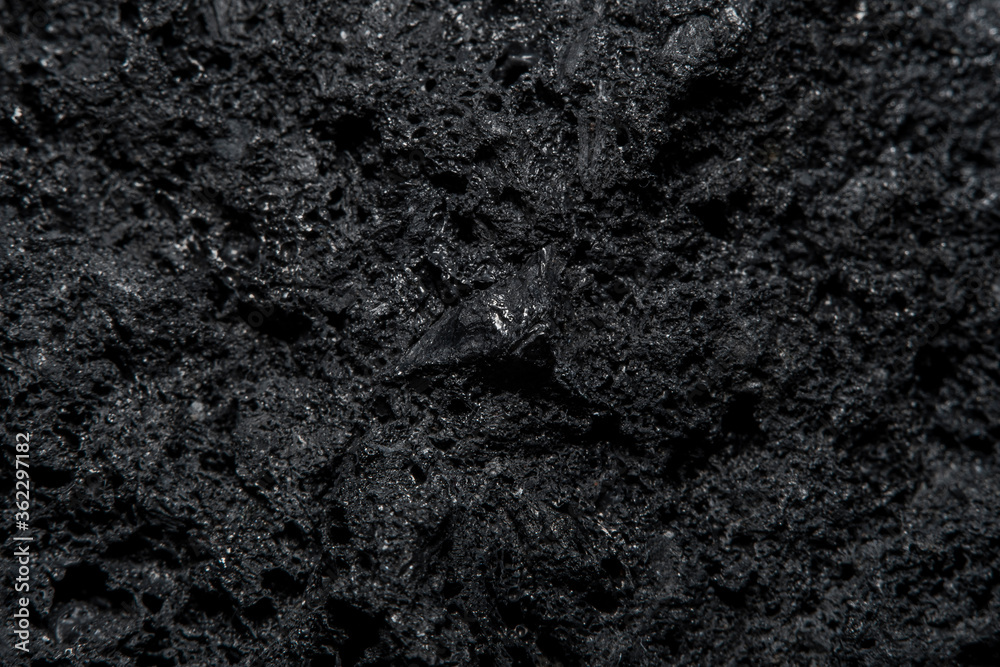 Blurred in soft focus at high magnification. Dark background with the ...