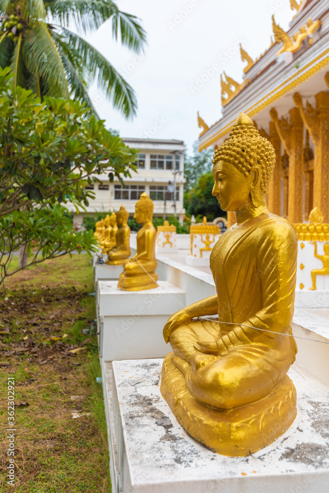 a statue of the golden Buddha, the symbol and heart of Koh Samui in ...