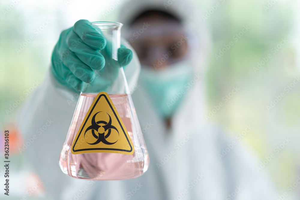 Asian scientist man in personal protective equipment uniform wearing ...