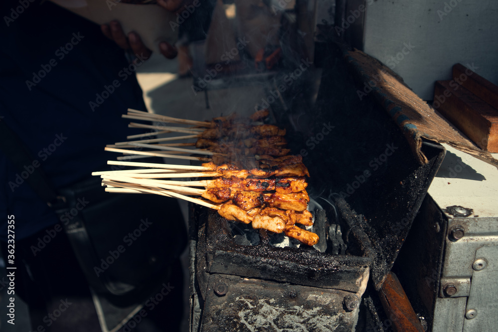 Indonesian chicken satay, street food in traditional markets Stock ...