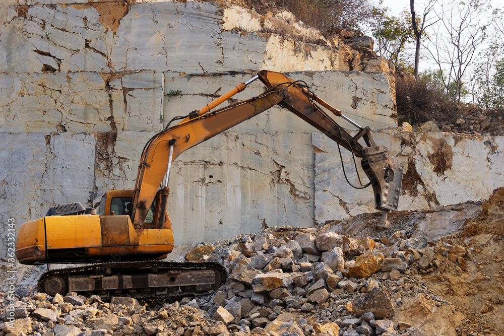 Breaker used to break up boulders in open cast mine. Mining in southern ...