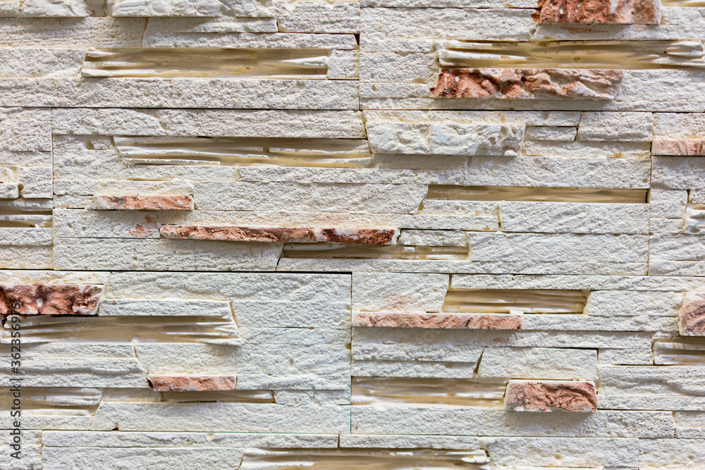 Stacked stone wall, natural stone cladding. Stone wall for background ...