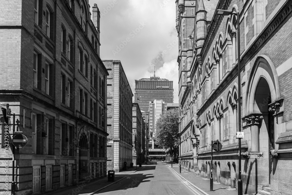 Poster A black and white streetscape in Manchester showing the ...