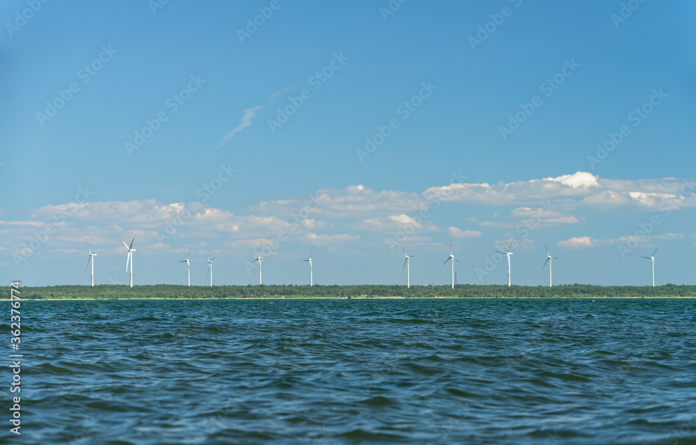 Virtsu wind farm. Turbine park next to harbor photographed from the ...