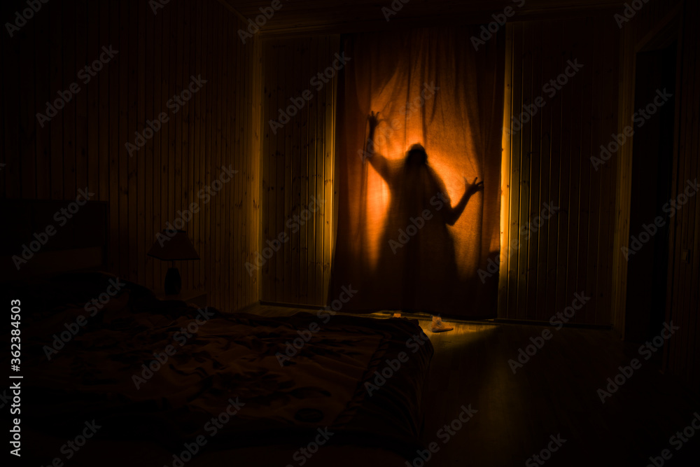 Horror woman in window wood hand hold cage scary scene halloween ...