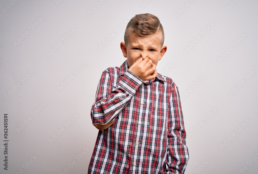 Young little caucasian kid with blue eyes wearing elegant shirt ...