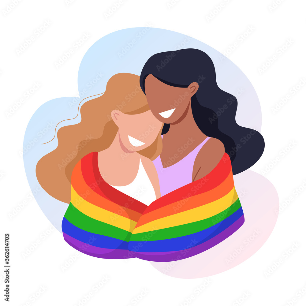Young women couple hug each other and hold a rainbow LGBT pride flag ...