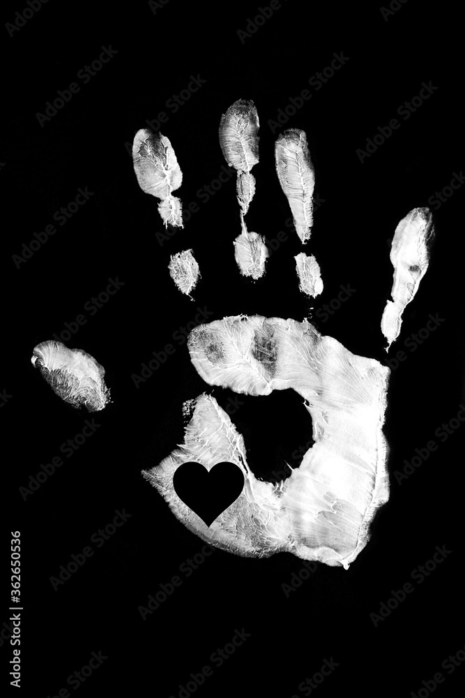 White handprint with heart on a black background.Together. Palm print ...
