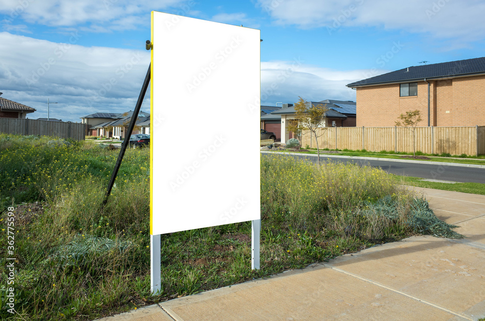 Blank white empty mockup template of a real estate sign at front of a ...