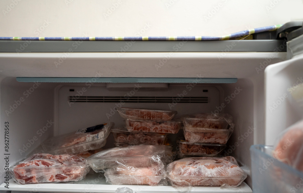 frozen meat inside refrigerator Stock Photo | Adobe Stock