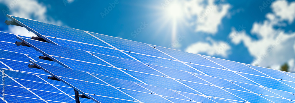 Solar panels with blue sky. Photovoltaics in solar power station energy ...