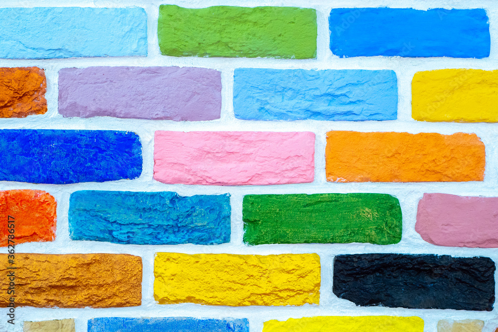 Background from multi-colored brickwork. The texture of a brick painted ...