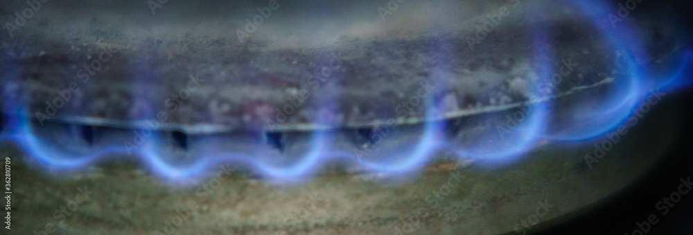 Photography of a gas burner. The fire burns with a blue flame. Stock ...
