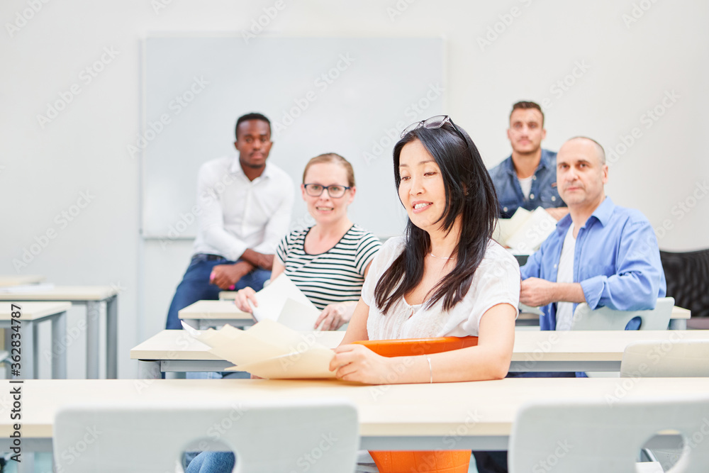 Students learn together in a university seminar Stock Photo | Adobe Stock