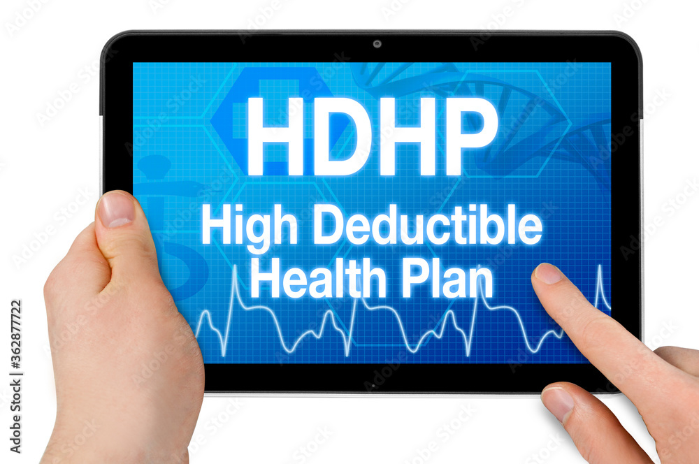 Tablet with medical device showing the acronym HDHP high deductible ...