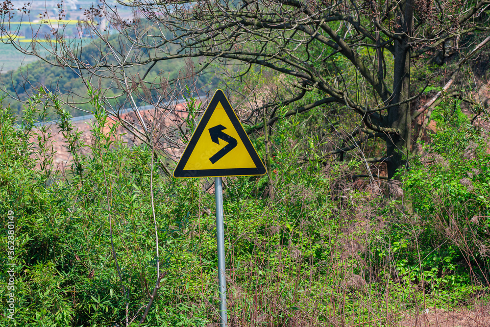 Sharp turn signs on mountain roads to ensure safe driving Stock Photo ...