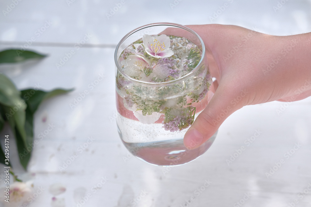 summer non alcoholic cocktail with floral ice cubes. floral infused ...