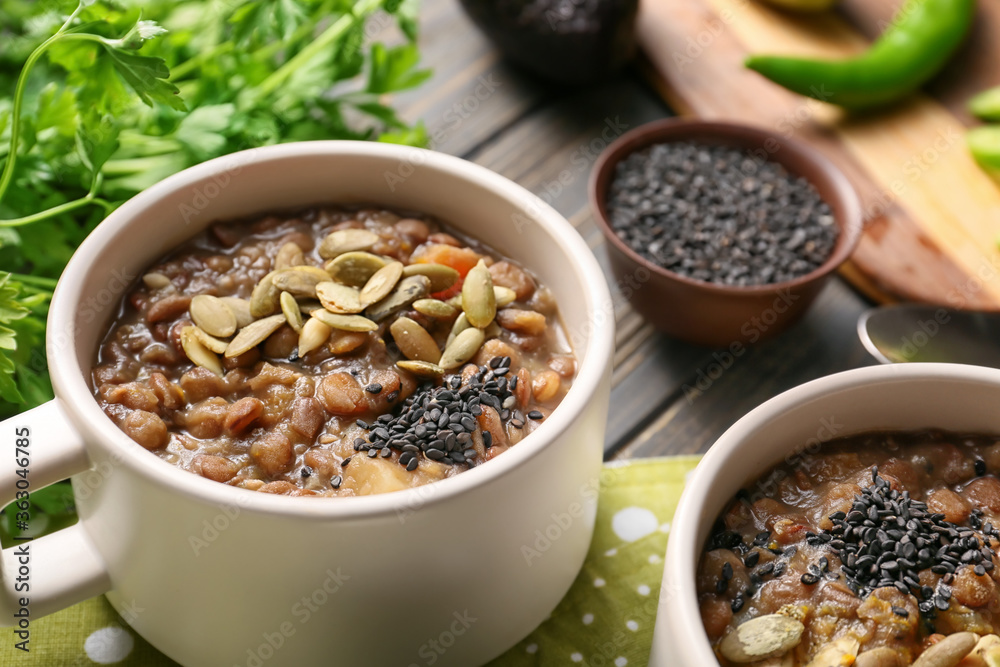 Cup of tasty lentils soup on table Stock Photo | Adobe Stock