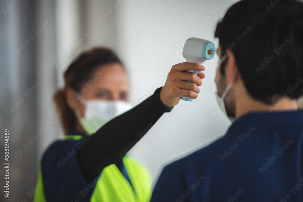 Health check factory personnel using medical digital temperature ...