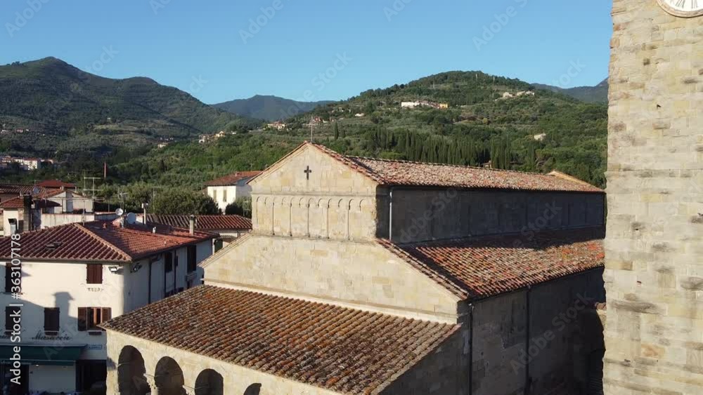 Ascending aerial view of an Ancient roman entire stone church of Peter ...