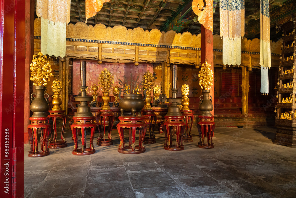 Temple interior, indoors, golden ornamets and typical Chinese letters ...