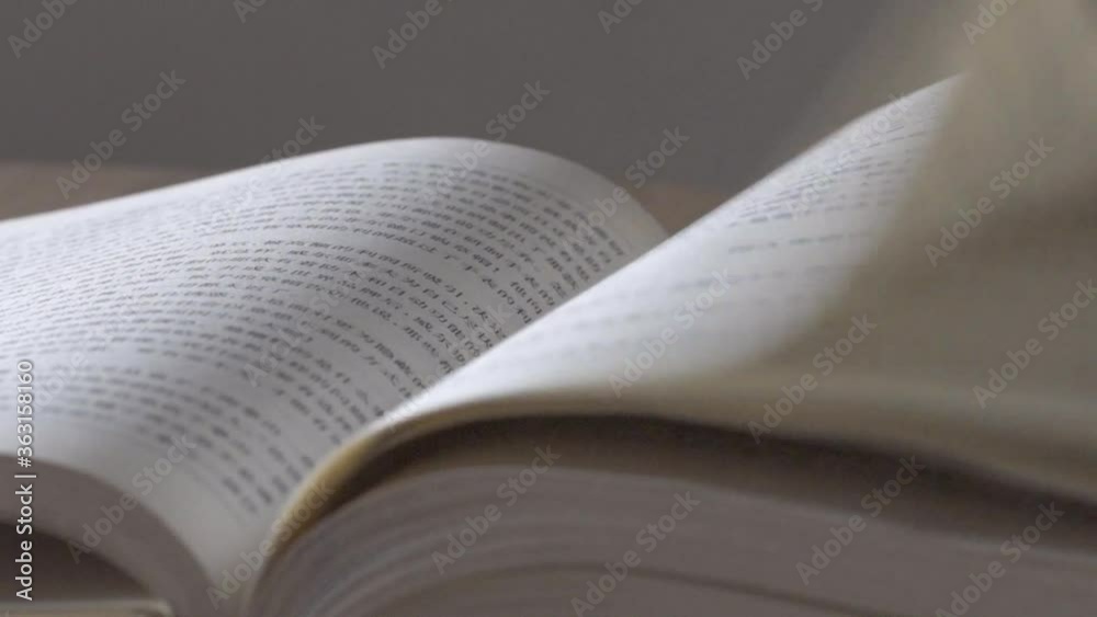 The book was blown open by the wind， Books are the ladder of human ...