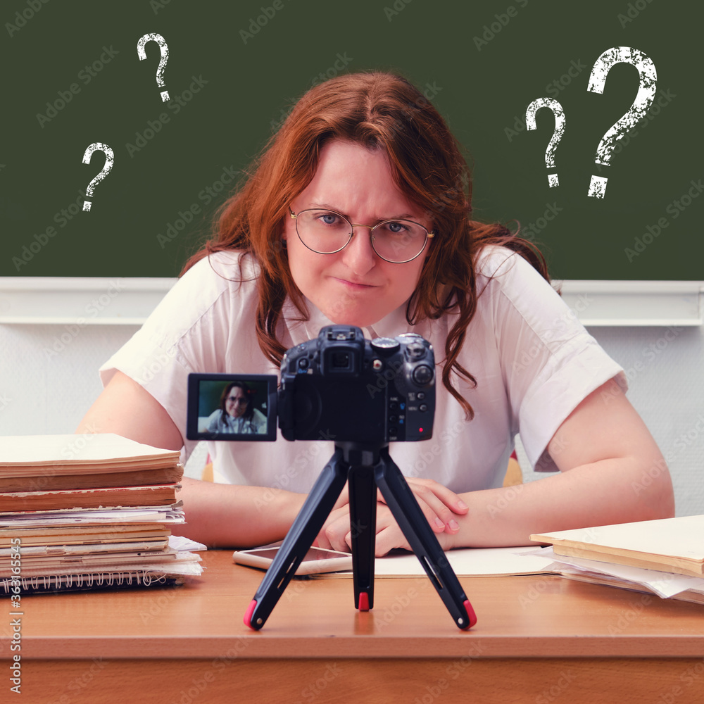 A school teacher is at a loss in the classroom for an online lesson ...
