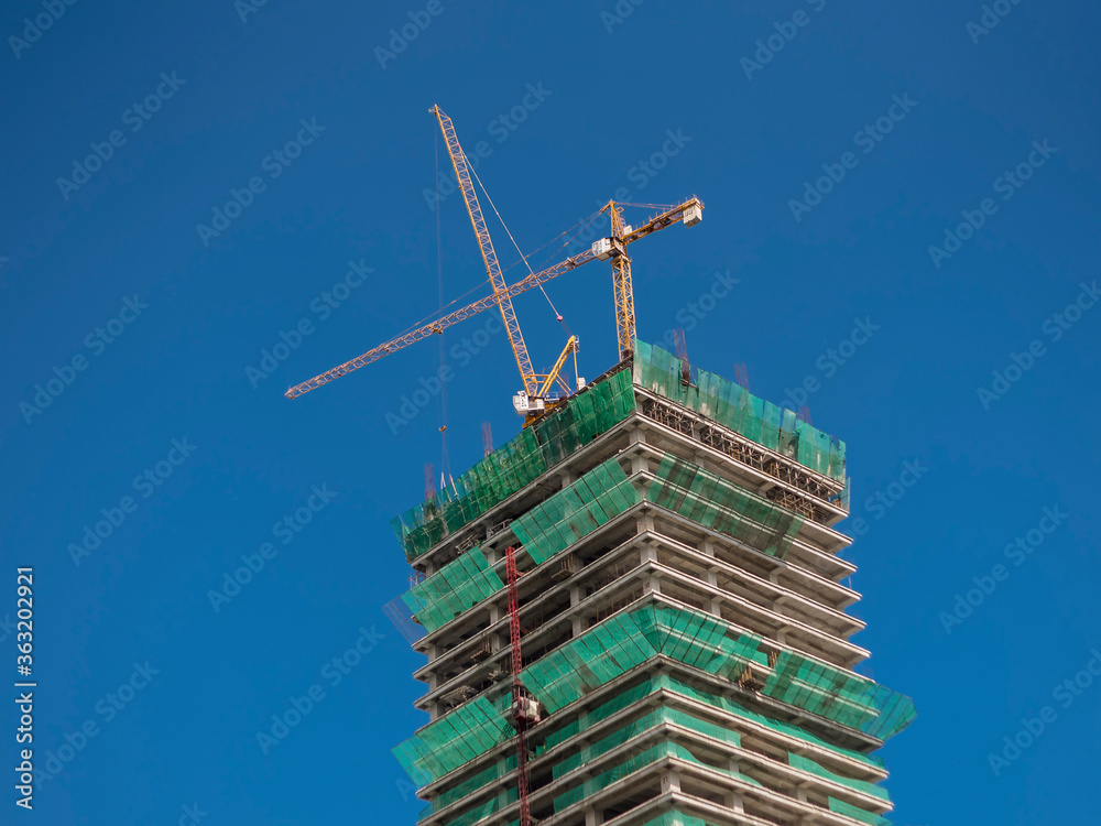 An under construction office tower in Metro Manila. Construction of ...