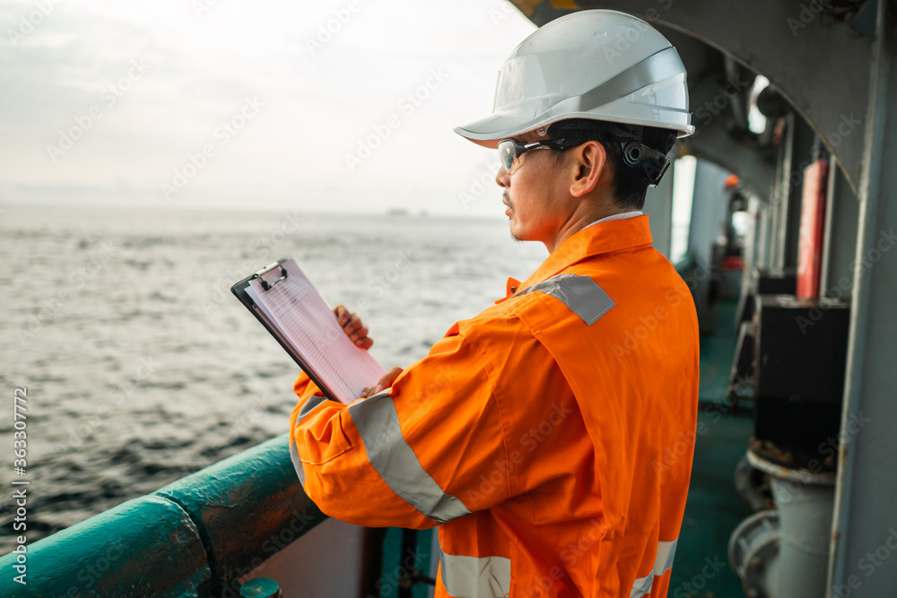 Filipino deck Officer on deck of offshore vessel or ship , wearing PPE ...