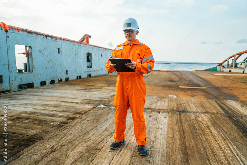 Filipino deck Officer on deck of offshore vessel or ship , wearing PPE ...